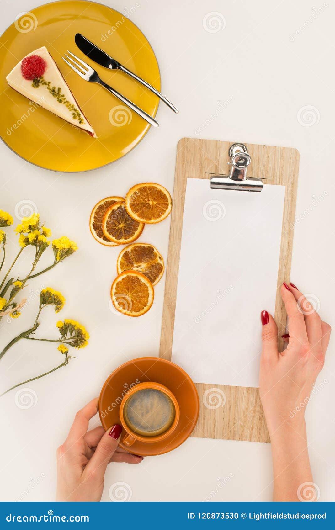 Top View of Hands Holding Cup of Coffee and Blank Menu Stock Photo ...