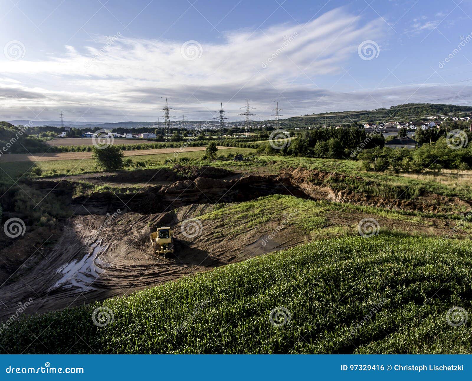 Top View Heavy Machine Excavator Bagger Working in Mud on Construction ...