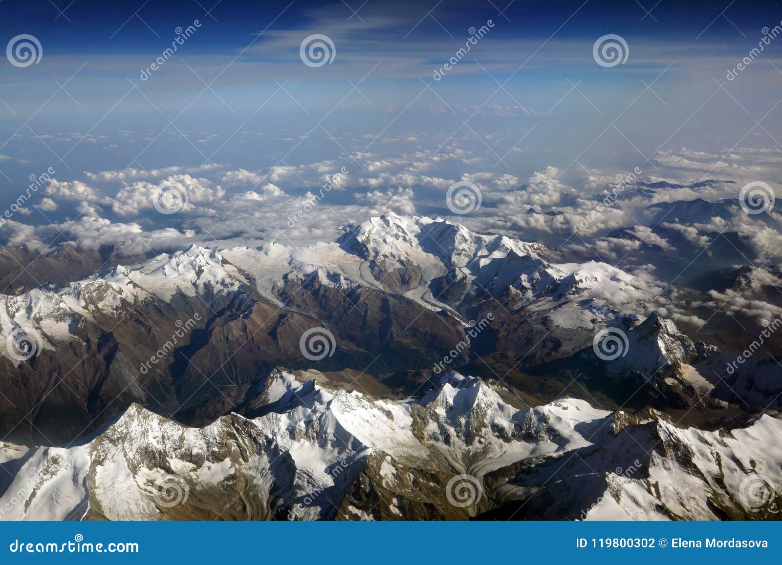 Top View of the High Mountains of the Alps and Clouds Stock Photo ...