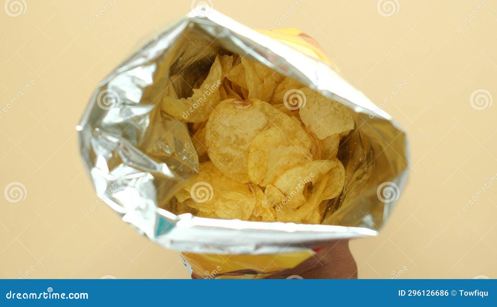 Top View of Holding a Open Potato Chips Packet Stock Footage - Video of ...