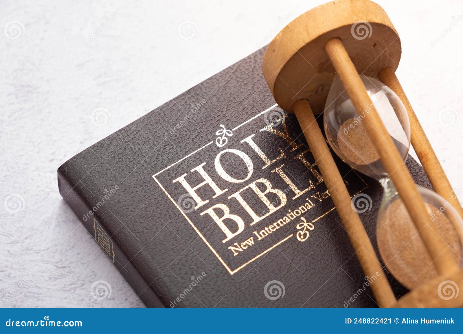 Top View of the Holy Bible on the Desktop with Hourglass. the Concept ...