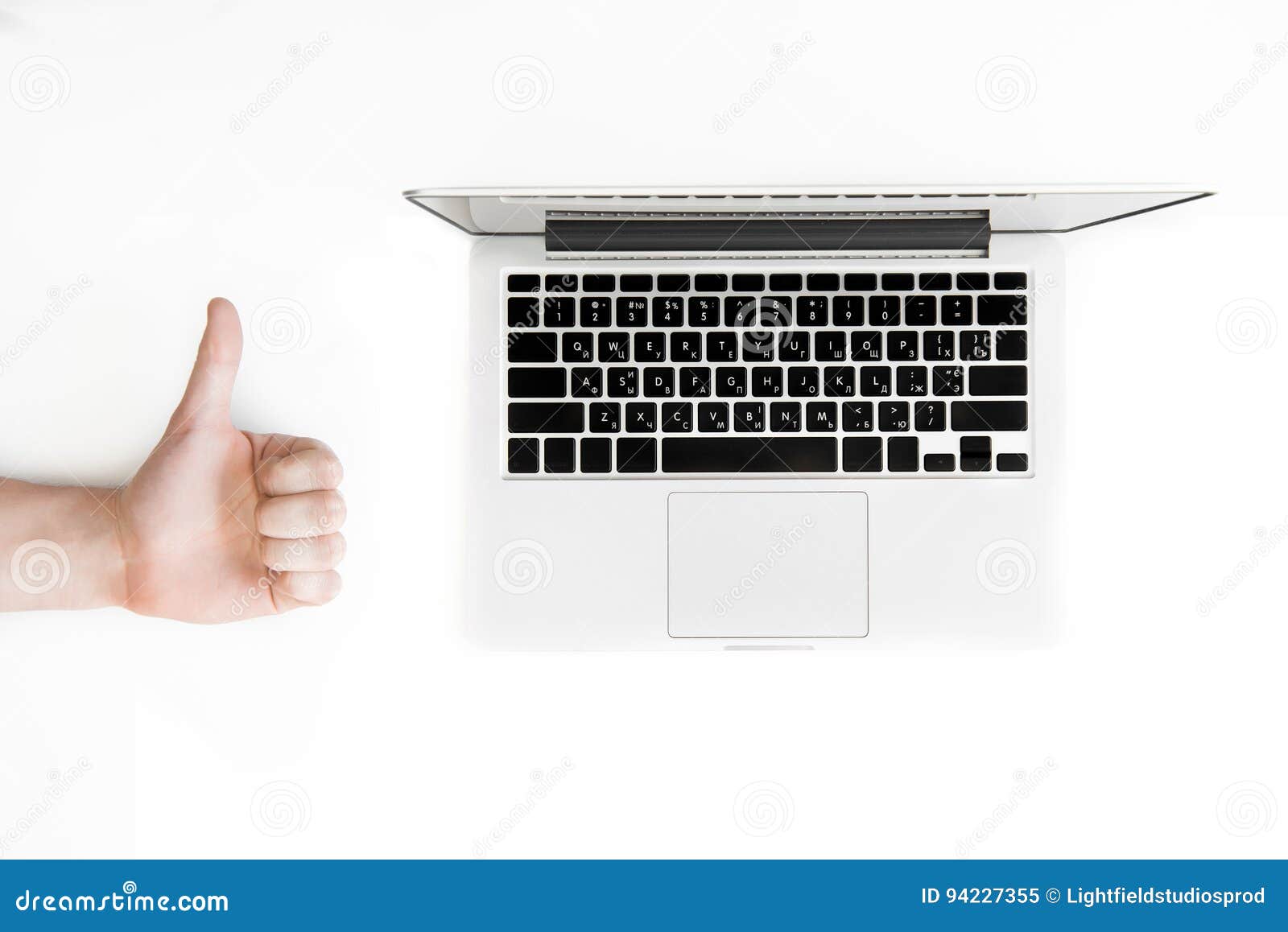 Top View of Human Hand with Thumb Up and Laptop Computer Isolated on ...