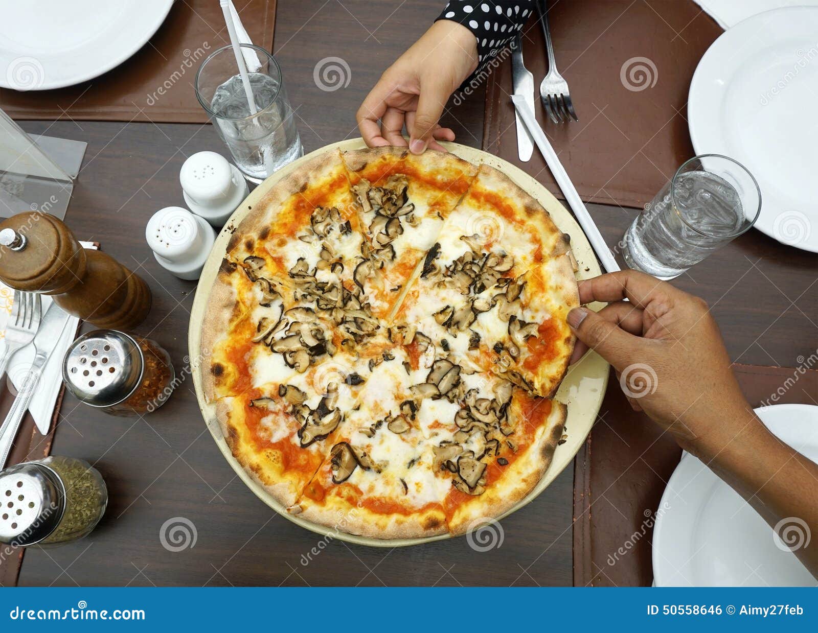 Human Hand Picking Pepperoni Pizza Stock Photos - Free & Royalty-Free ...