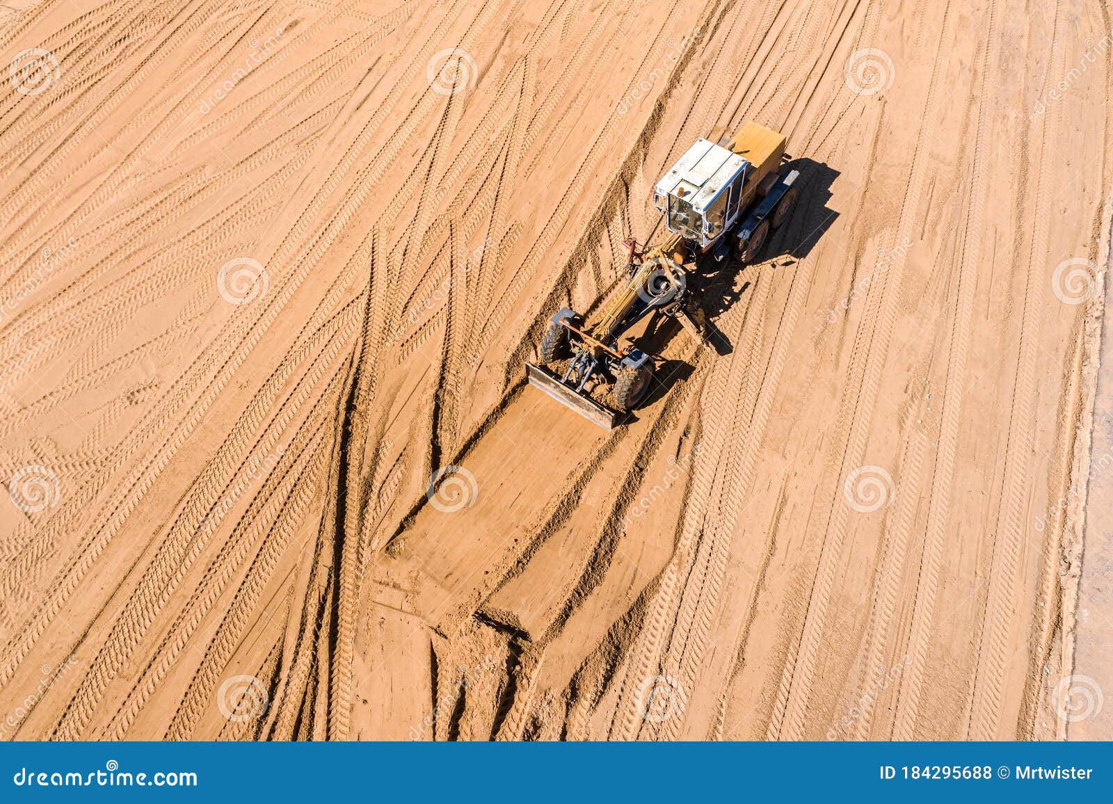 Top View of Industrial Road Grader on Construction Site. Leveling the ...