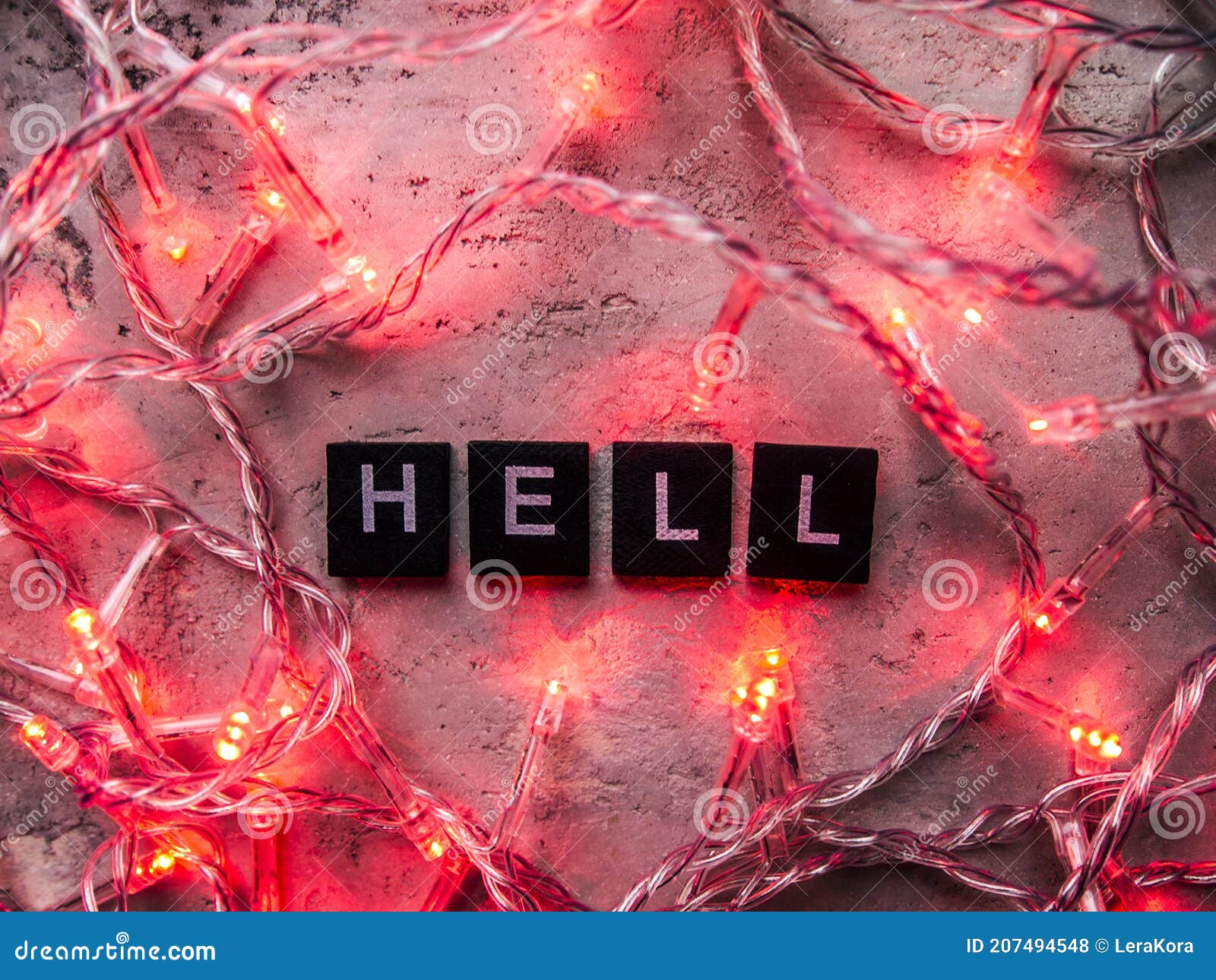Top View of the Inscription Hell on a Red Lights Background Stock Photo ...