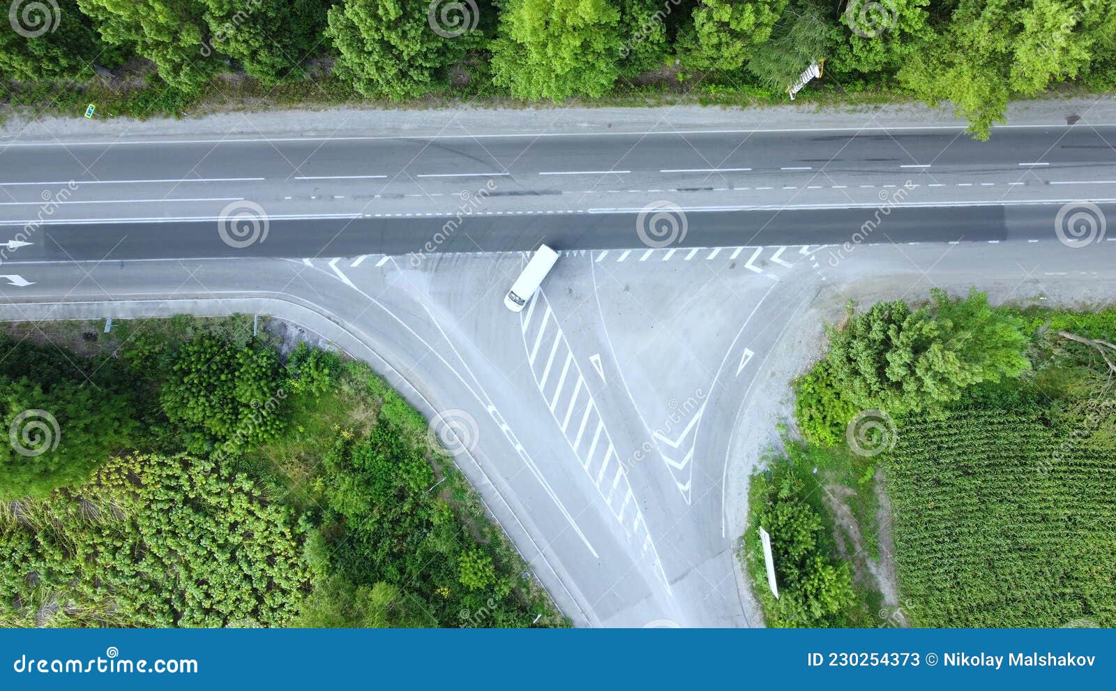 Top View on the Intersection of Roads in the Green Area. Stock Image ...