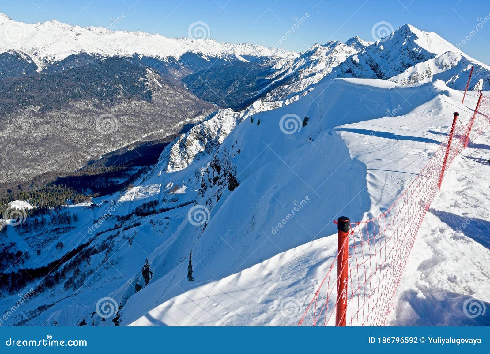 Landscape of Deep Gorges and High Mountains with Snow-capped Peaks ...