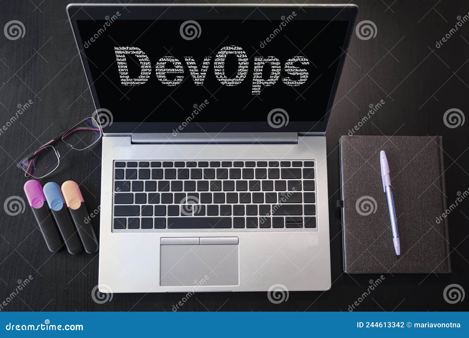 Top View Of Laptop With Text Devops Devops Inscription On Laptop