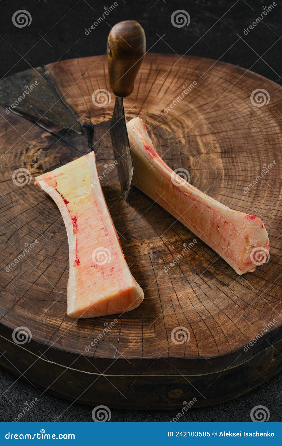 Top View of Large Beef Bone Marrow Chopped with Cleaver on Half Stock ...