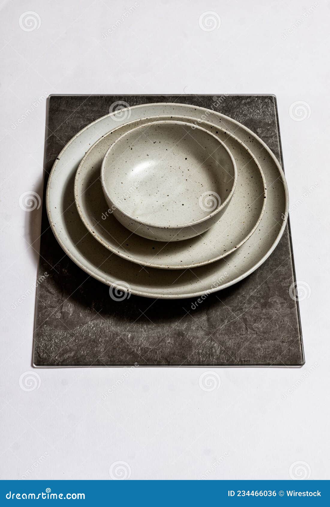 Top View of Layers of Dining Plates on a Stone Surface Stock Photo ...