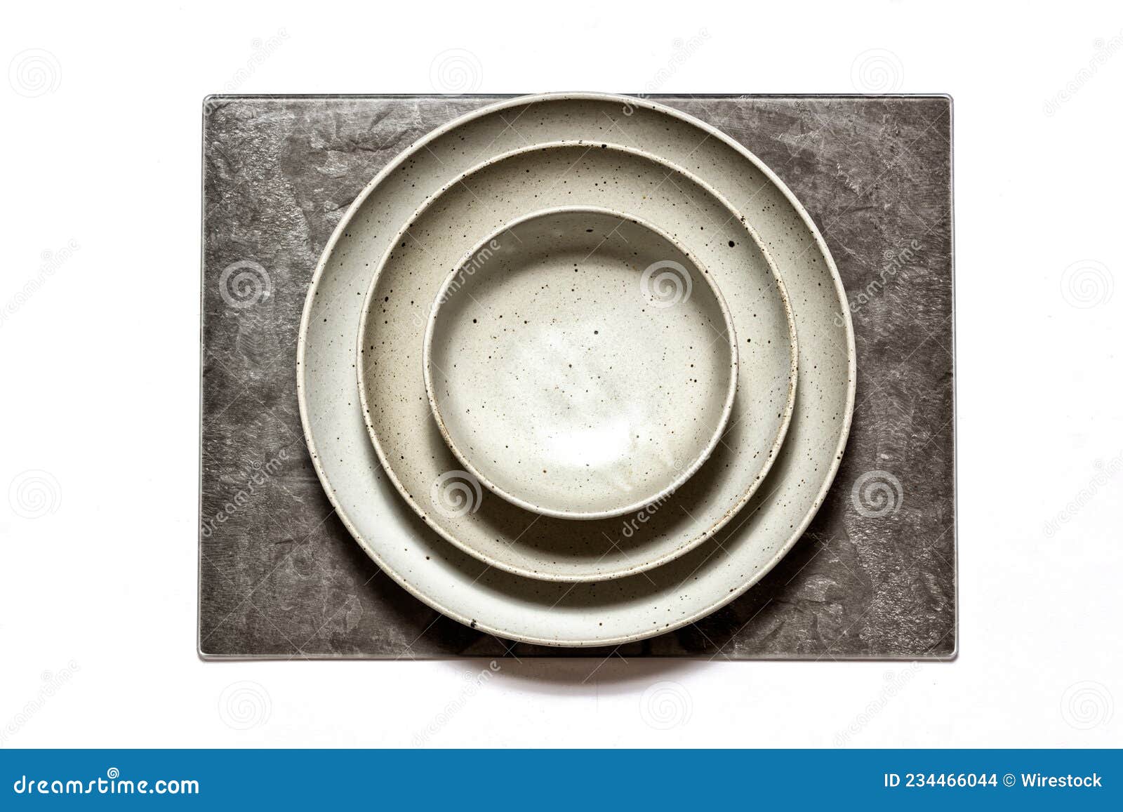 Top View of Layers of Dining Plates on a Stone Surface Stock Photo ...