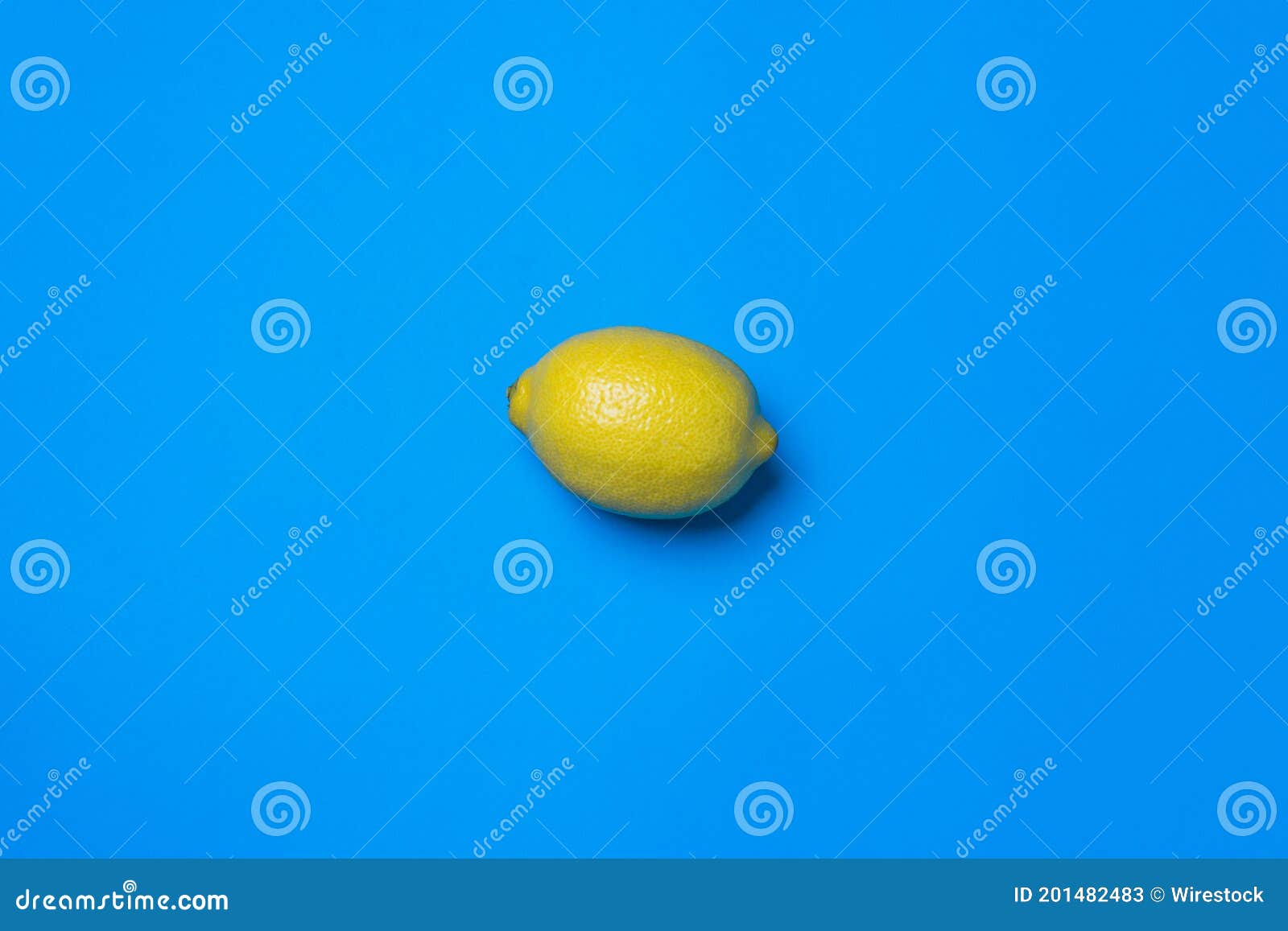 Top View of a Lemon on Blue Background with an Empty Space for a Text ...