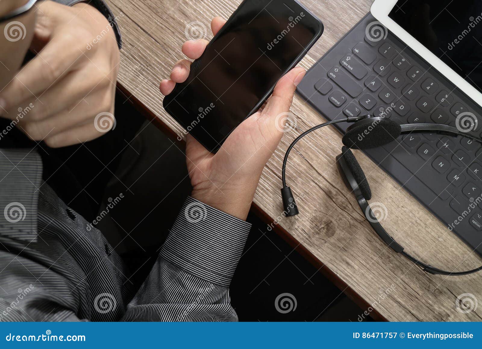 Top View of Man Hand Using VOIP Headset with Digital Tablet Comp Stock ...