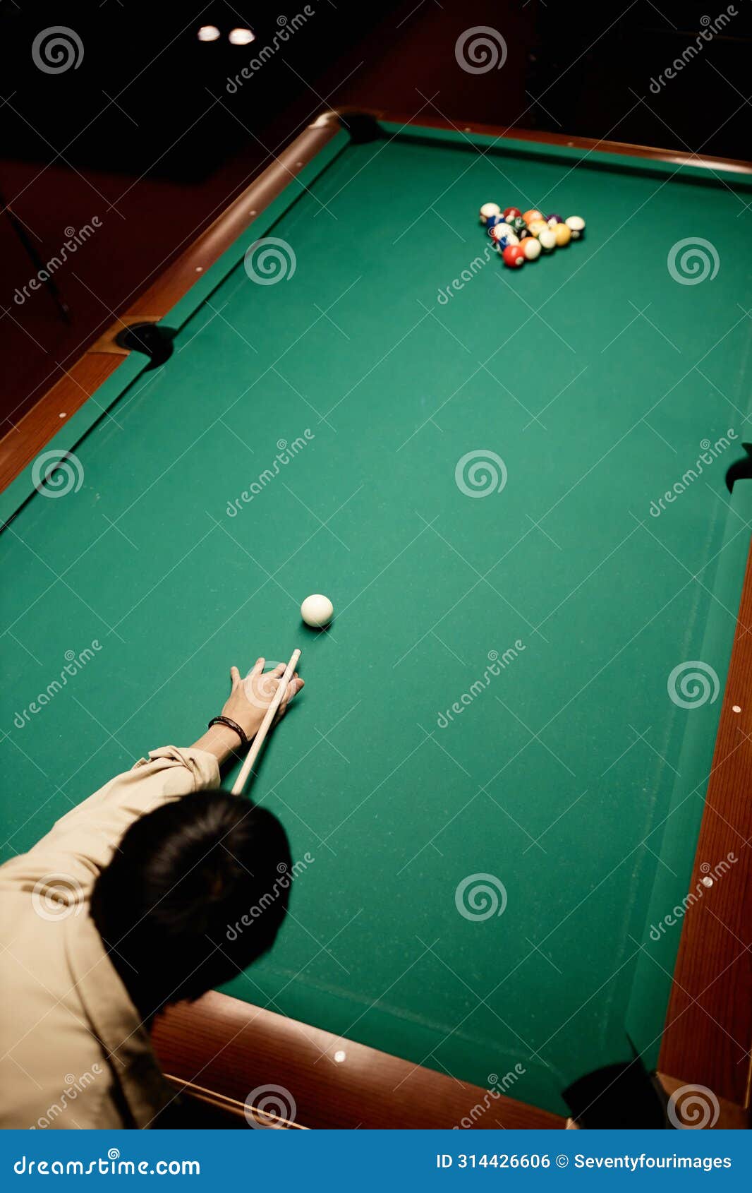Top View of Man Playing Pool at Table Nd Hitting Ball with Cue Stick ...