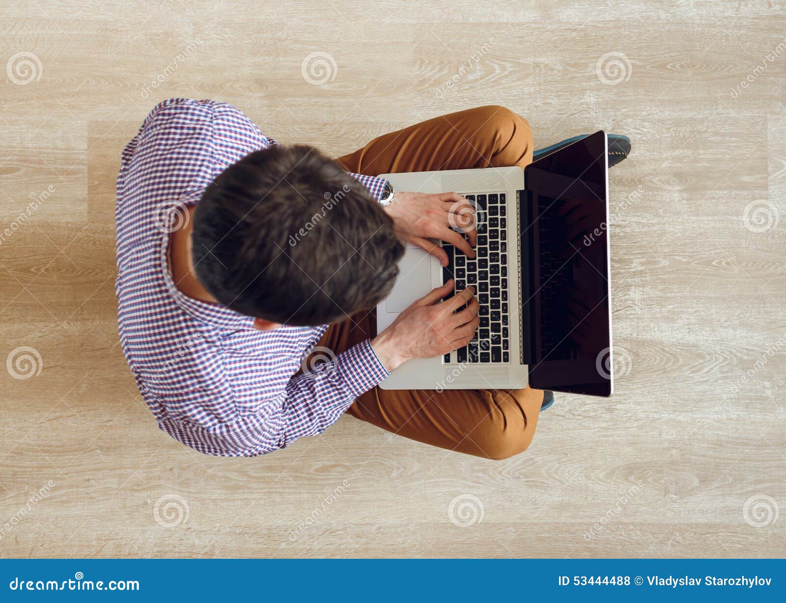 Top View of Man Sitting on the Floor and Working with a Laptop Stock ...
