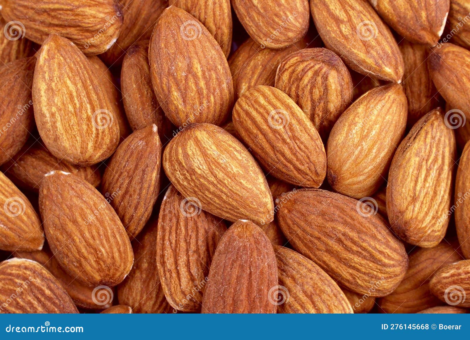 Top View of Many Brown Almond Nuts Texture Close Up. Stock Photo ...