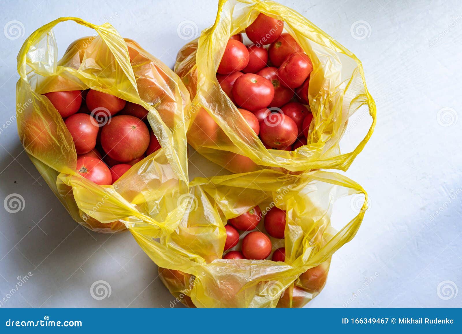Top View of Many Red Tomatoes in the Plastic Package Begs, the Plastic ...