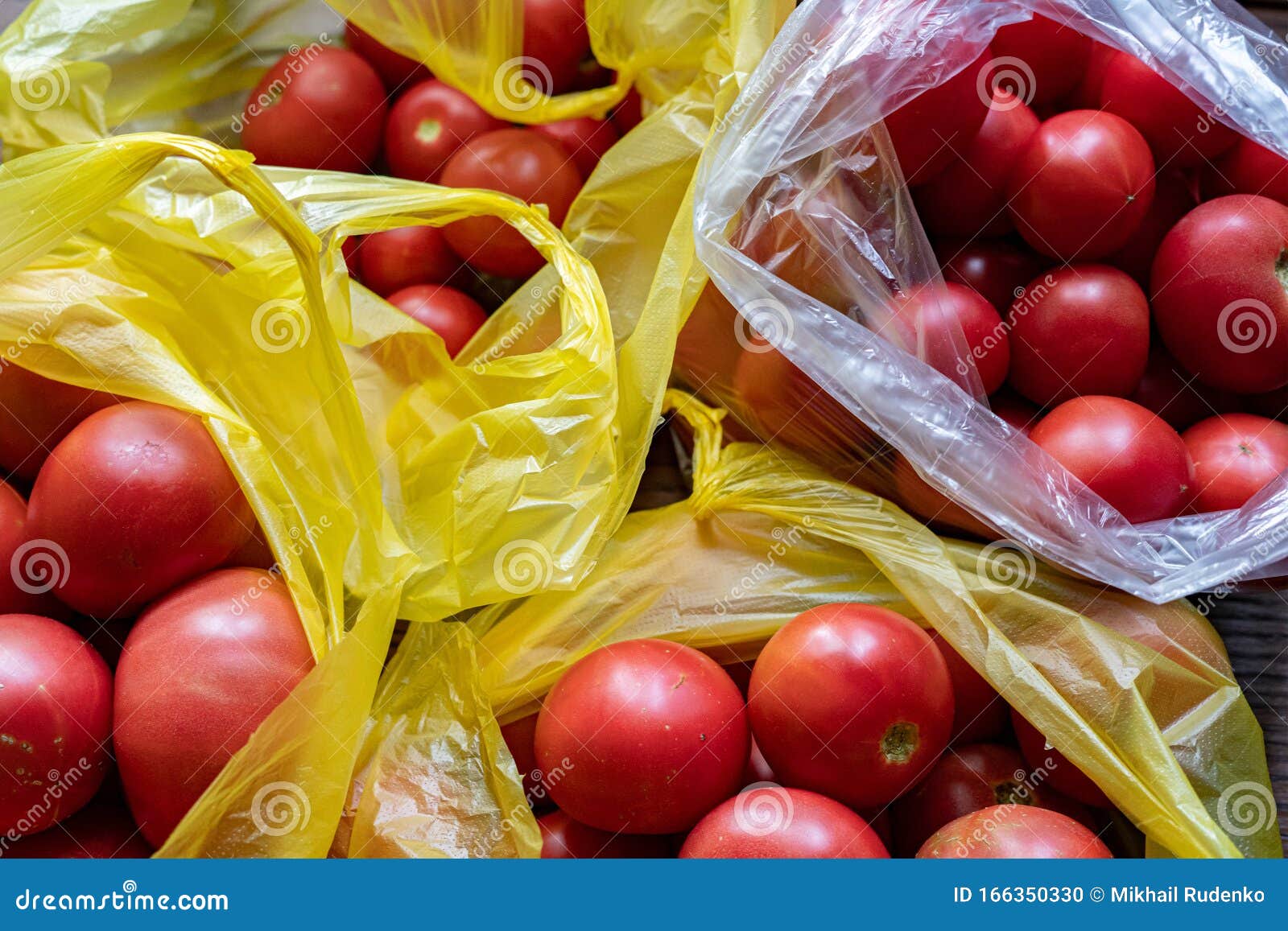 Top View of Many Red Tomatoes in the Plastic Package Begs, the Plastic ...