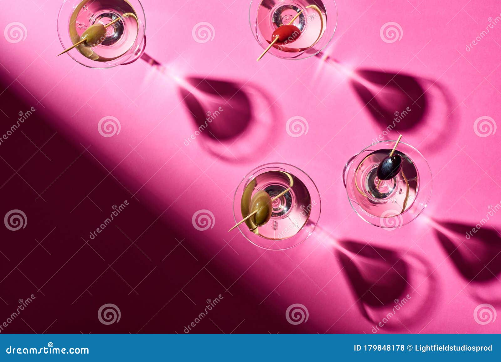 Top View Of Martini Cocktails On Bright Pink Background With Shadow ...