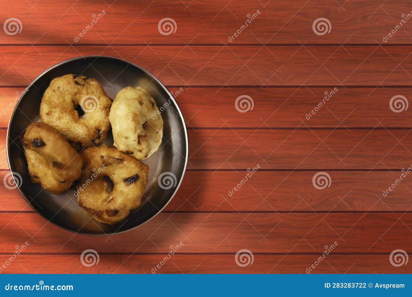 Top View of Medu Vada in a Bowl on a Wooden Background Stock Photo ...