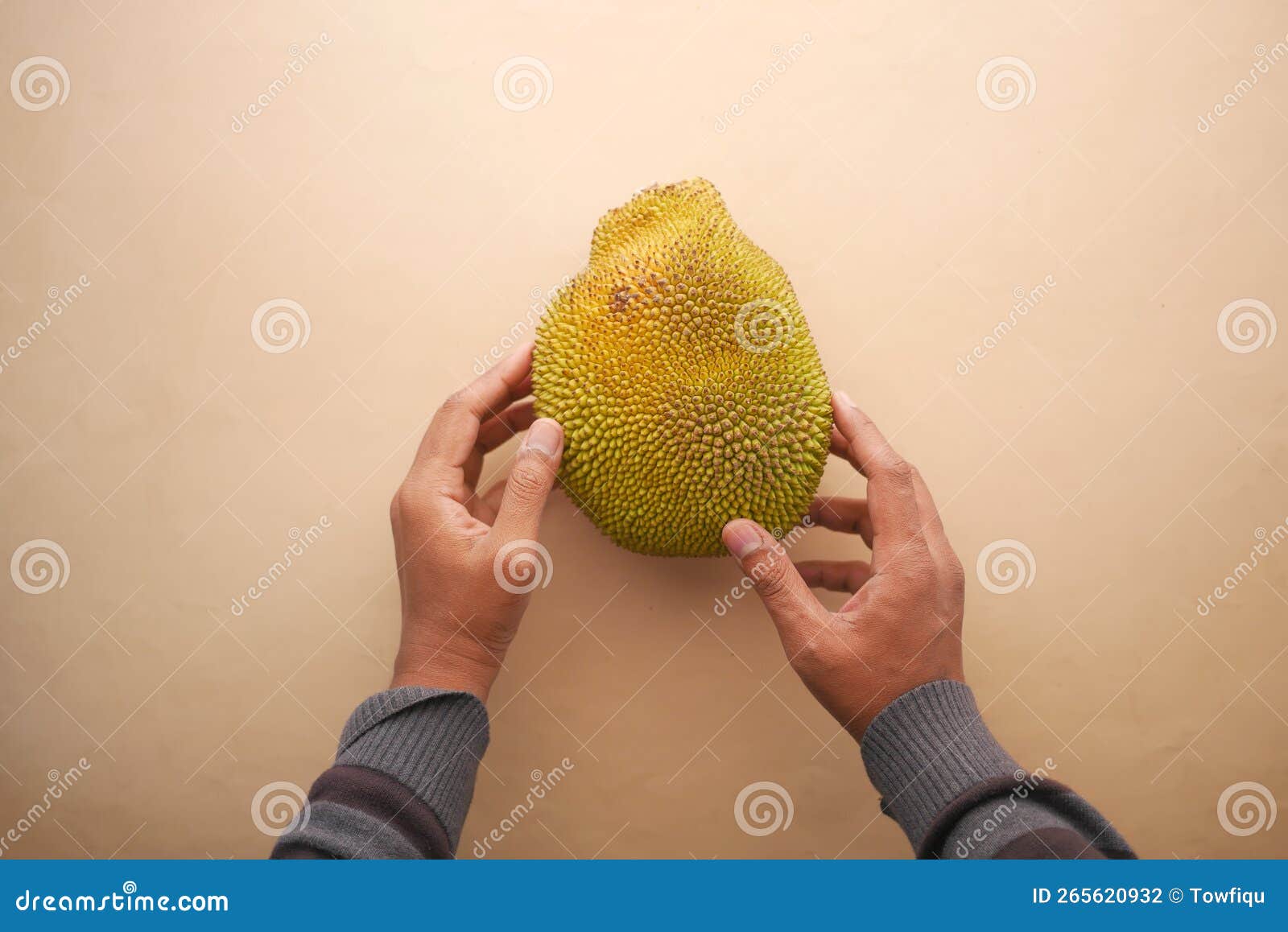 Top View of Men Holding a Jackfruit on Table Stock Photo - Image of ...
