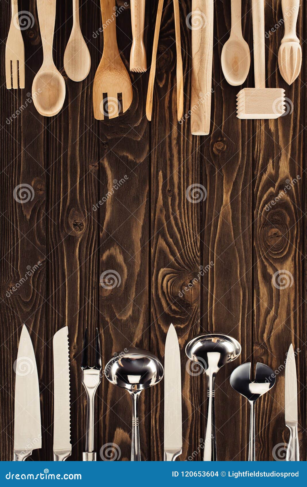 Top View of Metallic and Wooden Kitchen Utensils Placed in Two Rows ...
