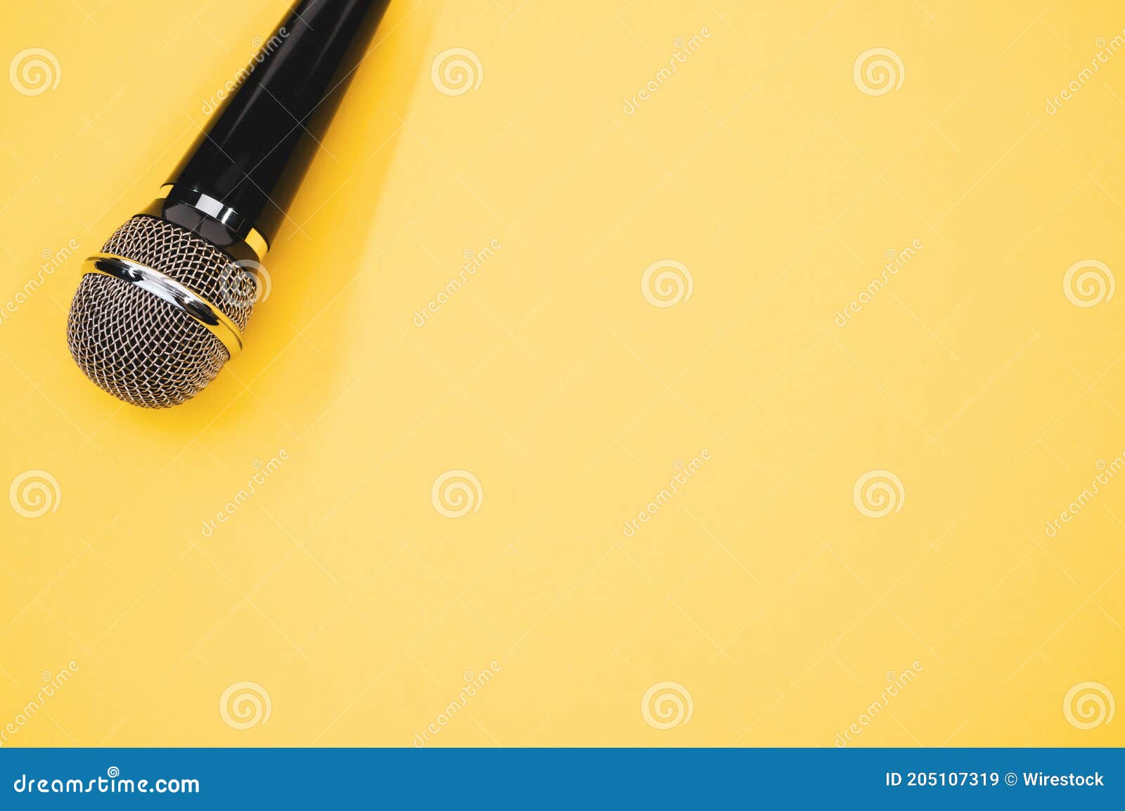 Top View of a Microphone on a Yellow Surface Stock Image - Image of ...