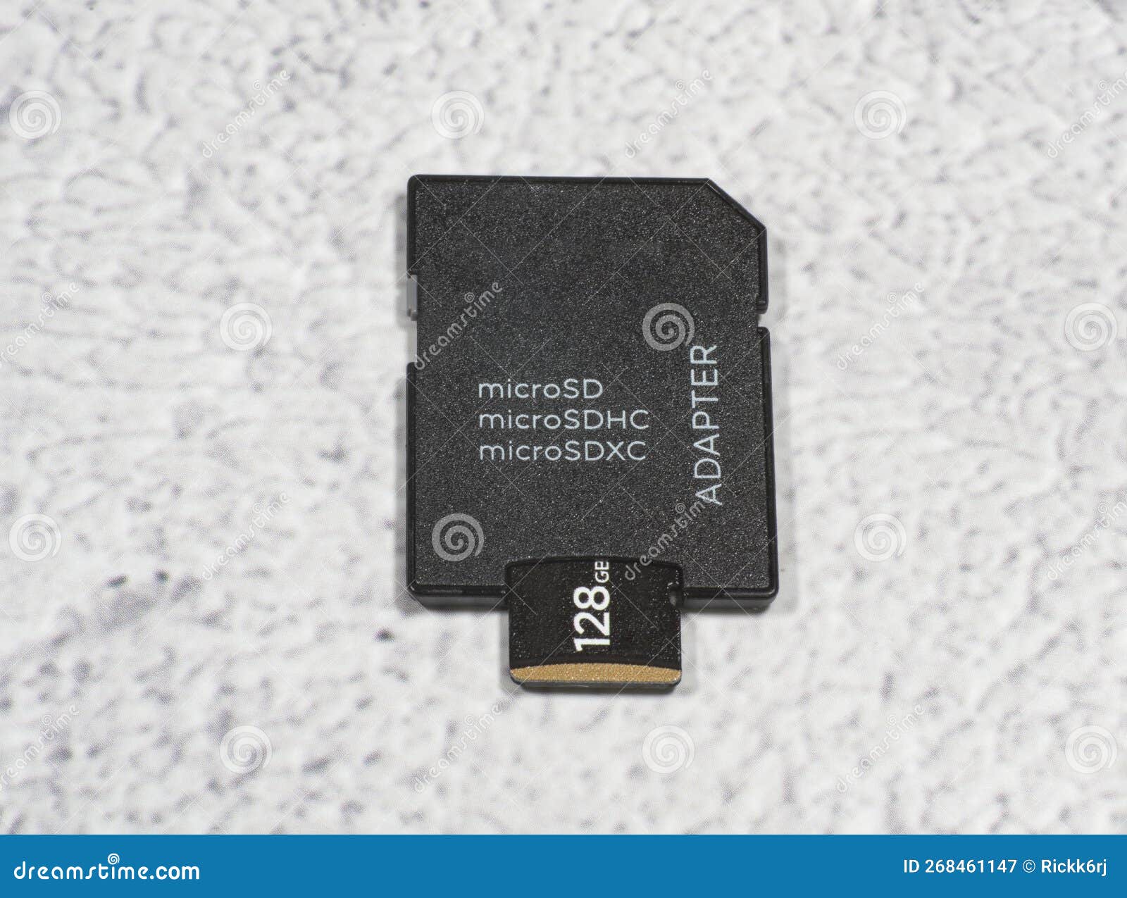 Top View of MicroSD Memory Card Partially Inserted into SD Adapter ...