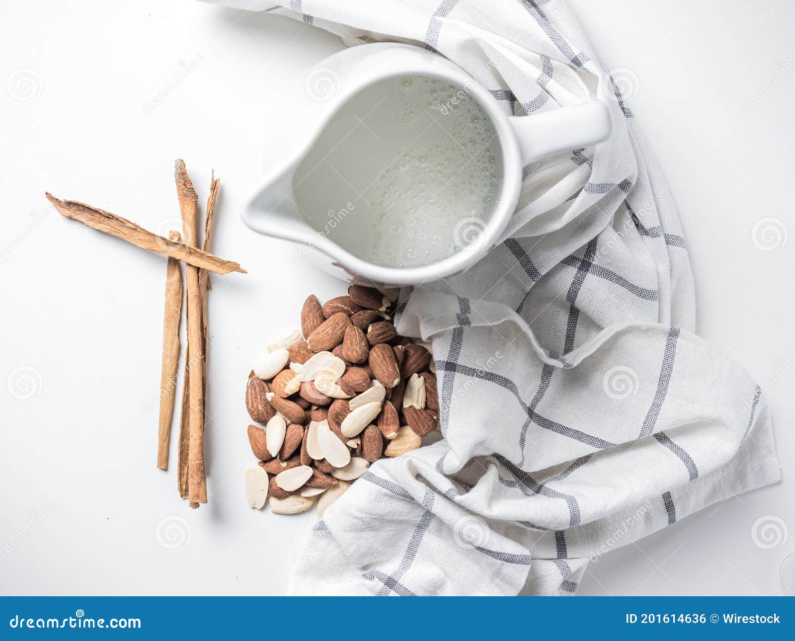 Top View of a Milk Jug and Almonds Decorated with a Piece of Fabric ...