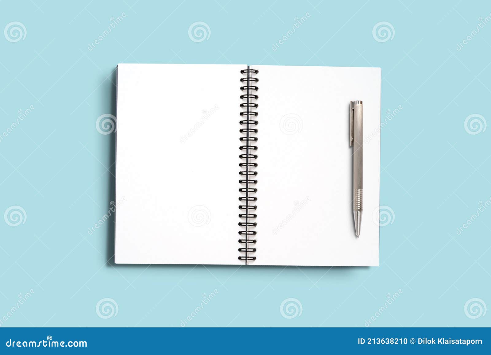 Top View Minimal Design of Open Notebook Memo with Pink Pencil on Blue ...