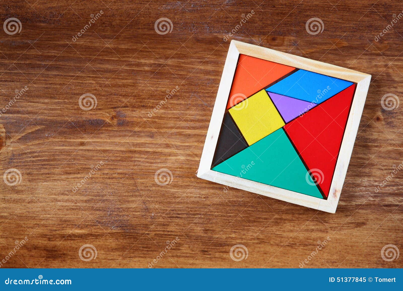 Top View of a Missing Piece in a Square Tangram Puzzle, Over Wooden ...