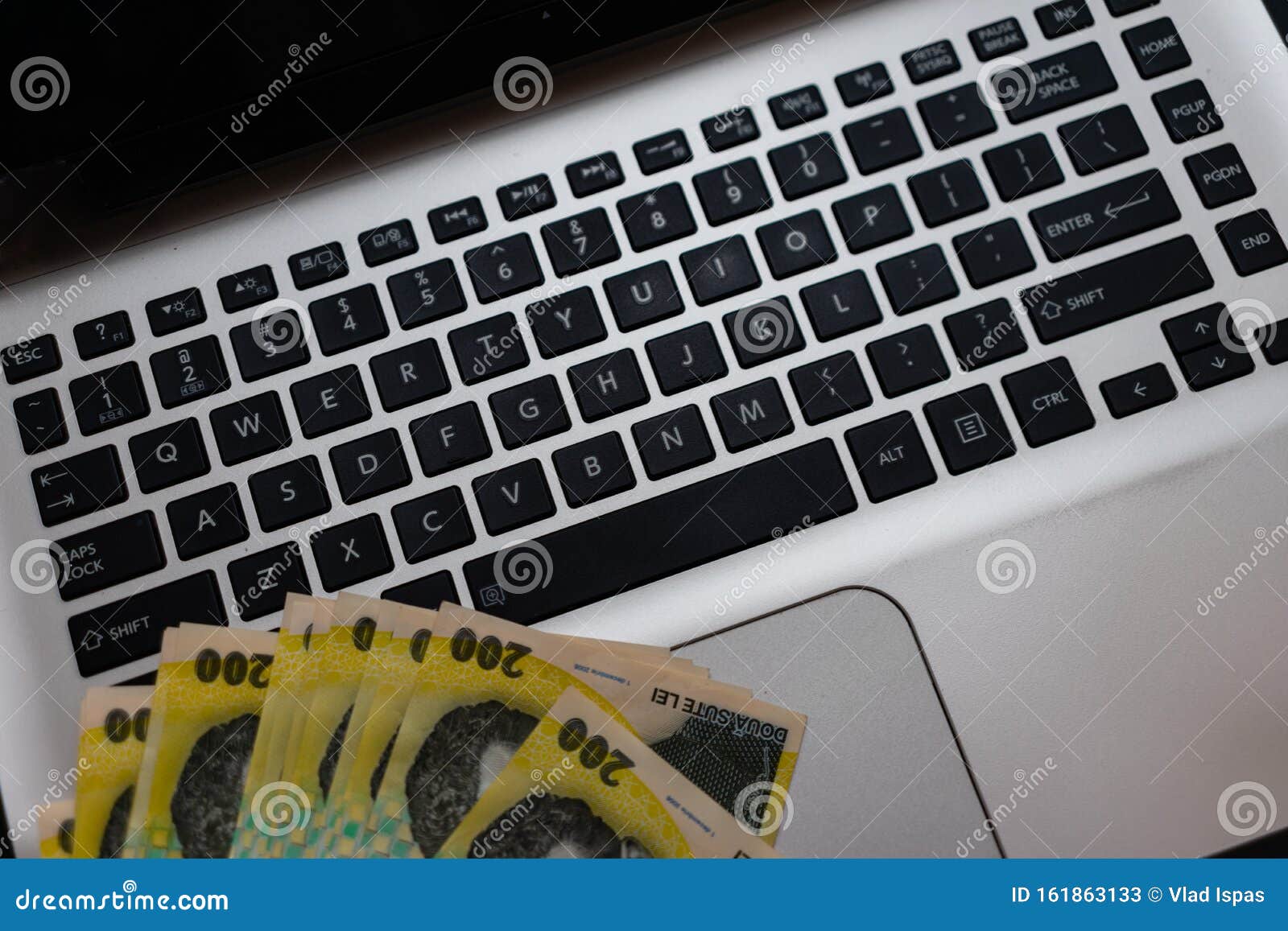 Top View of Money on Keyboard. LEI Money on Keyboard Stock Image ...