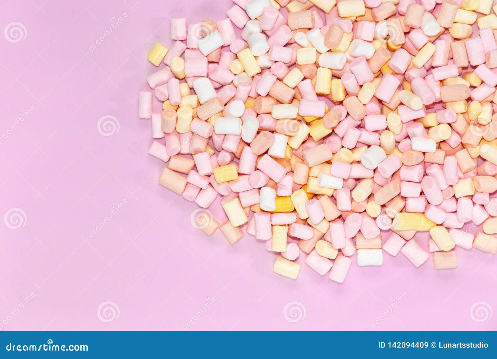 Top View on Multi-colored Marshmallows on a Monochrome Pink Background ...