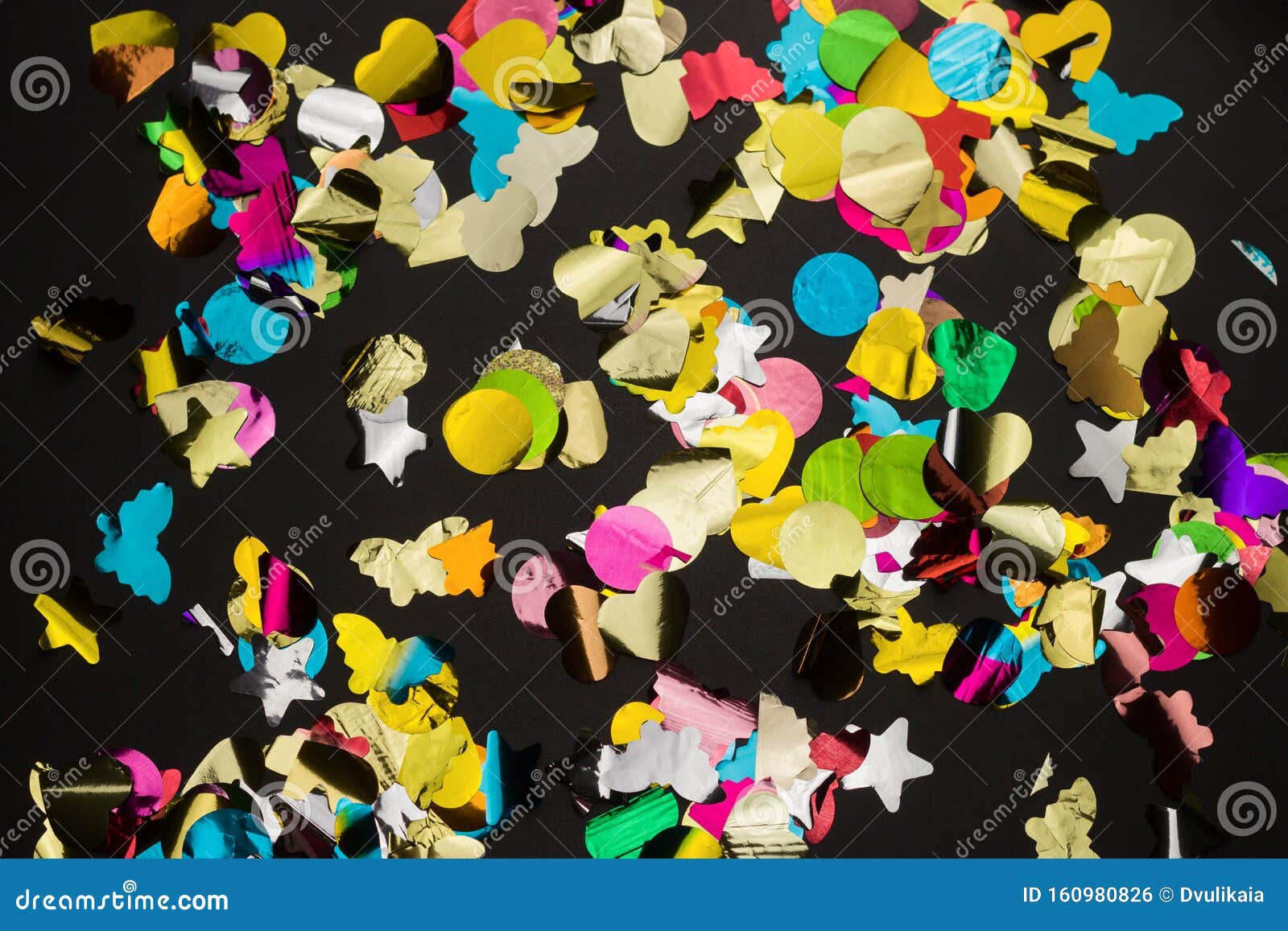 Multicolored Confetti Mess on a Black Background,abstract Holiday ...