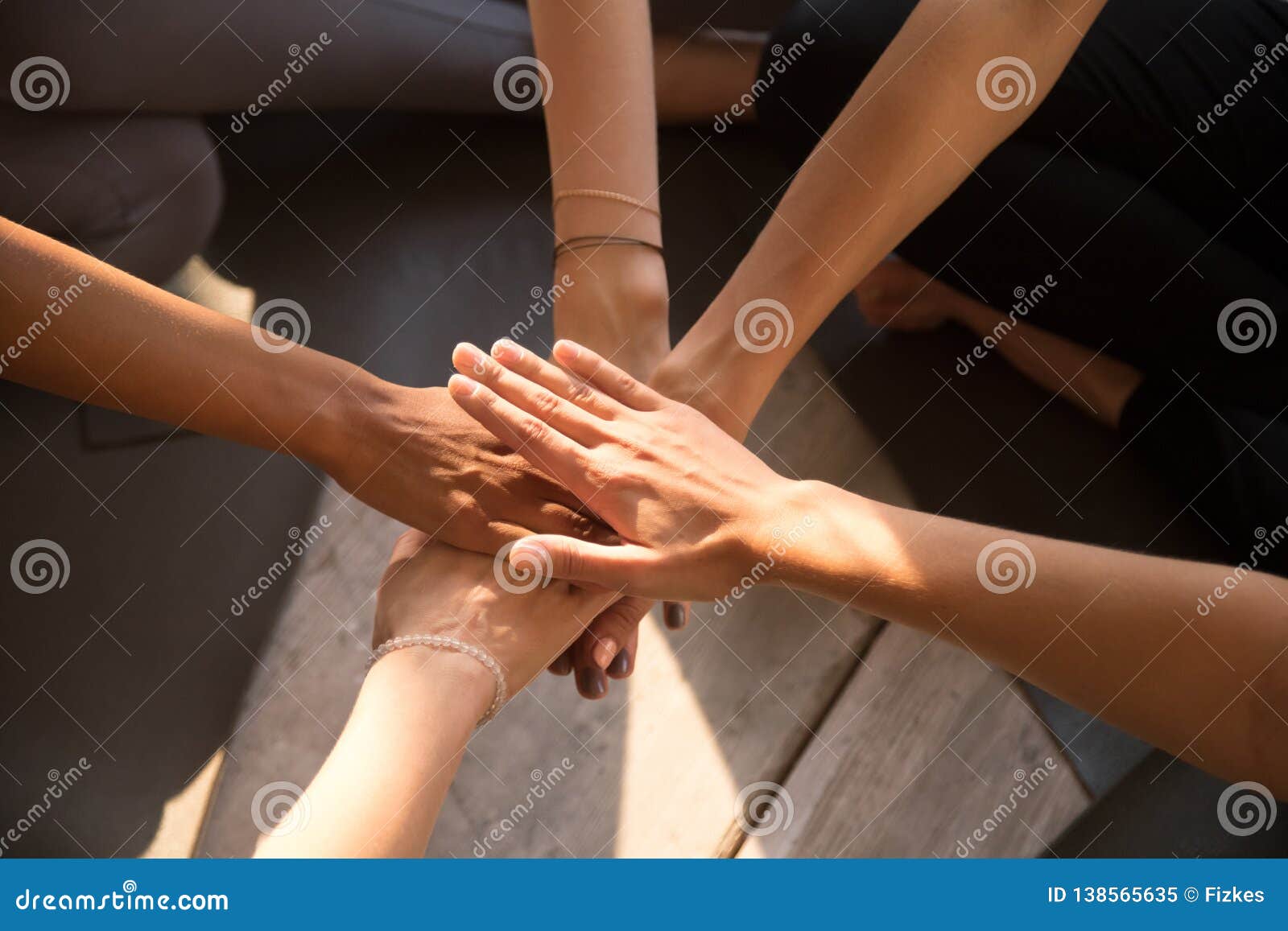 Top View of Women Stack Hands Engaged in Teambuilding Activity Stock ...