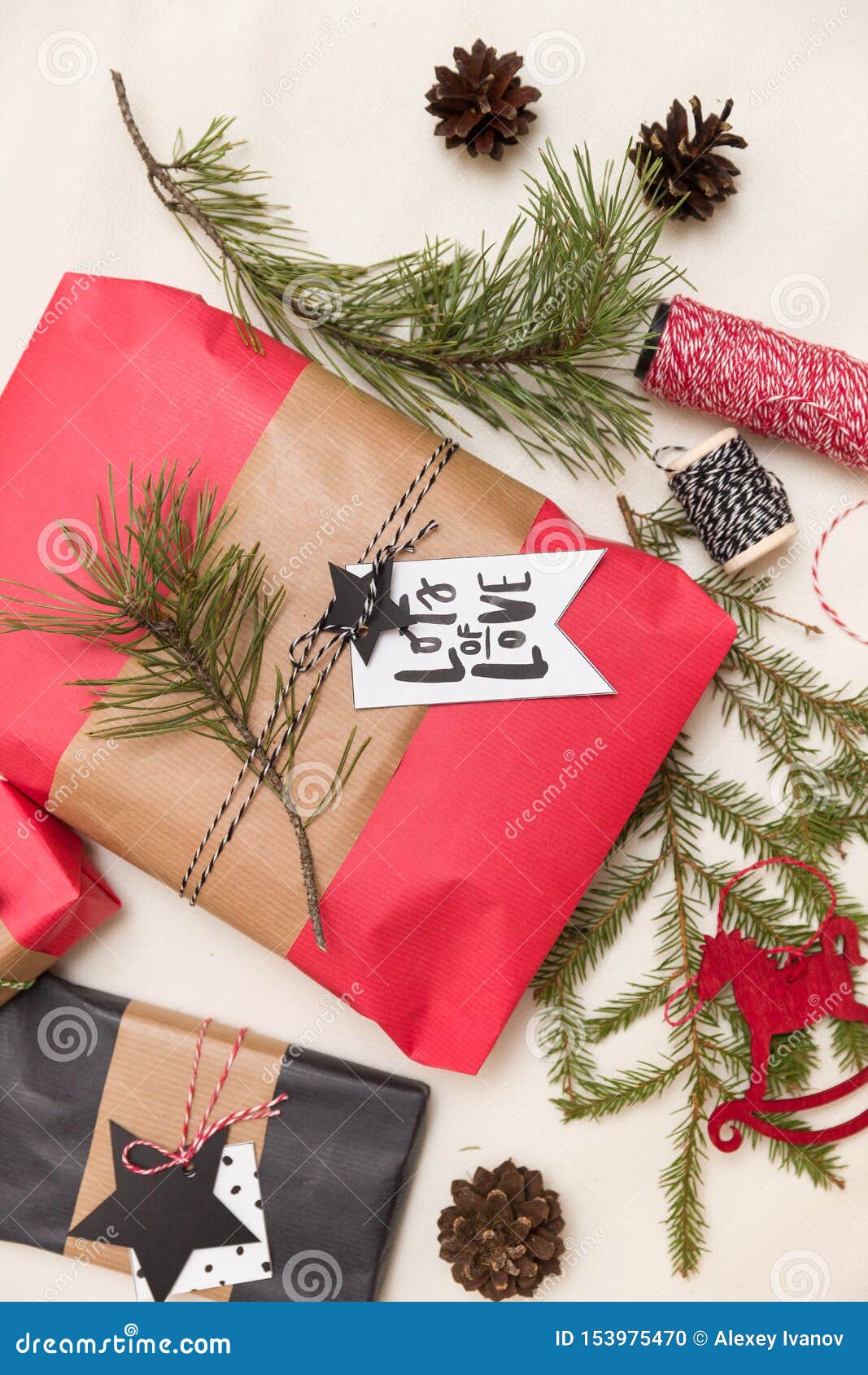 Top View on Nicely Wrapped Christmas Gifts and Decorations in Red and ... Top View on Nicely Wrapped Christmas Gifts and Decorations in Red and ...