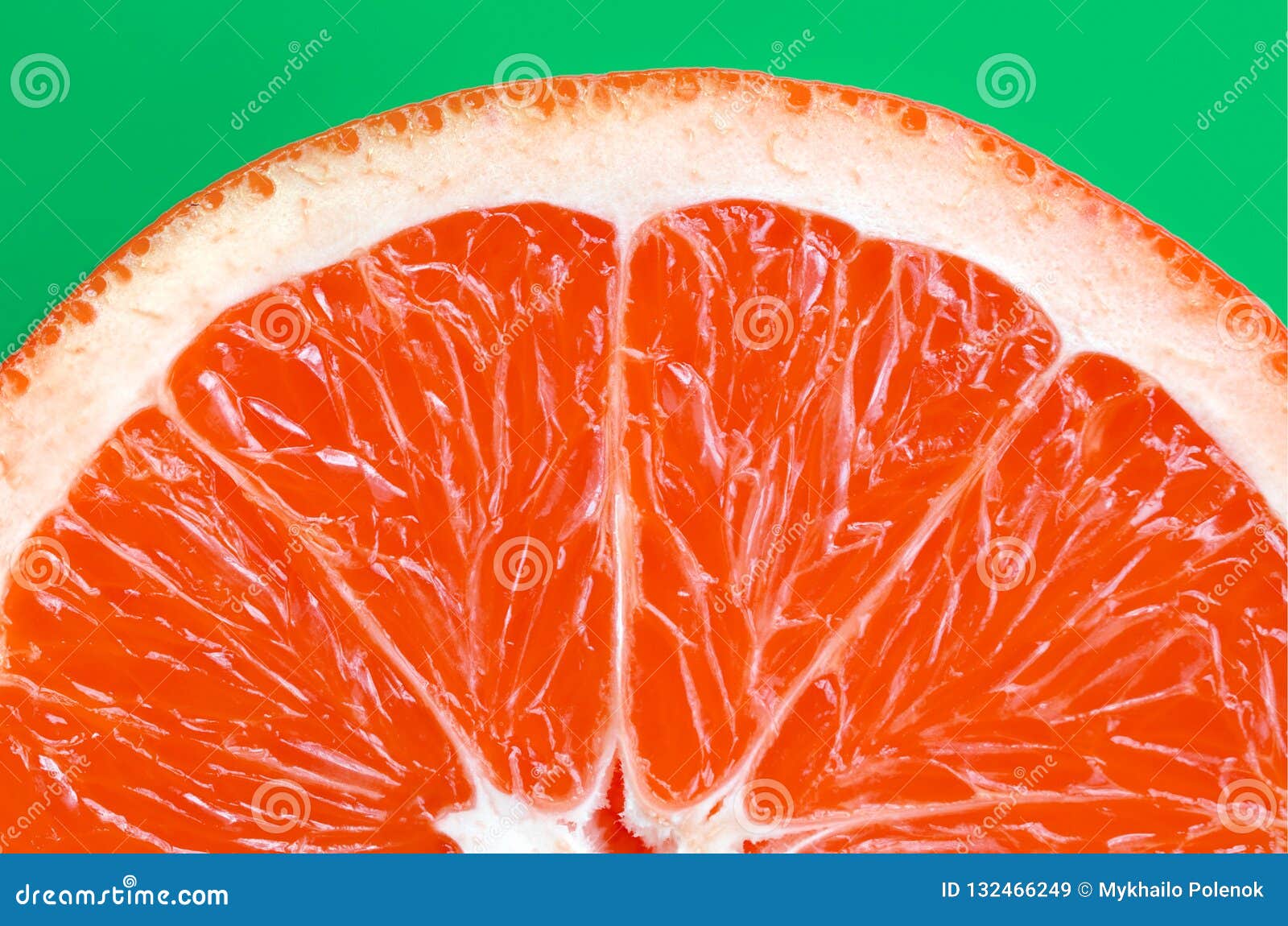 Top View of an One Grapefruit Slice on Bright Background in Green Color ...