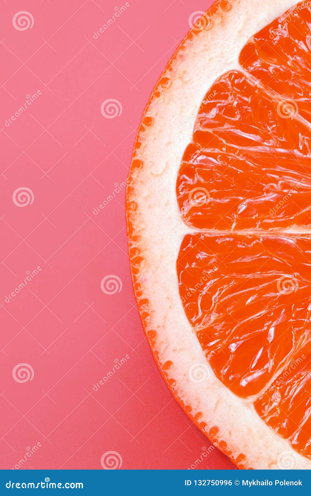 Top View of a One Grapefruit Slice on Bright Background in Light Pink ...