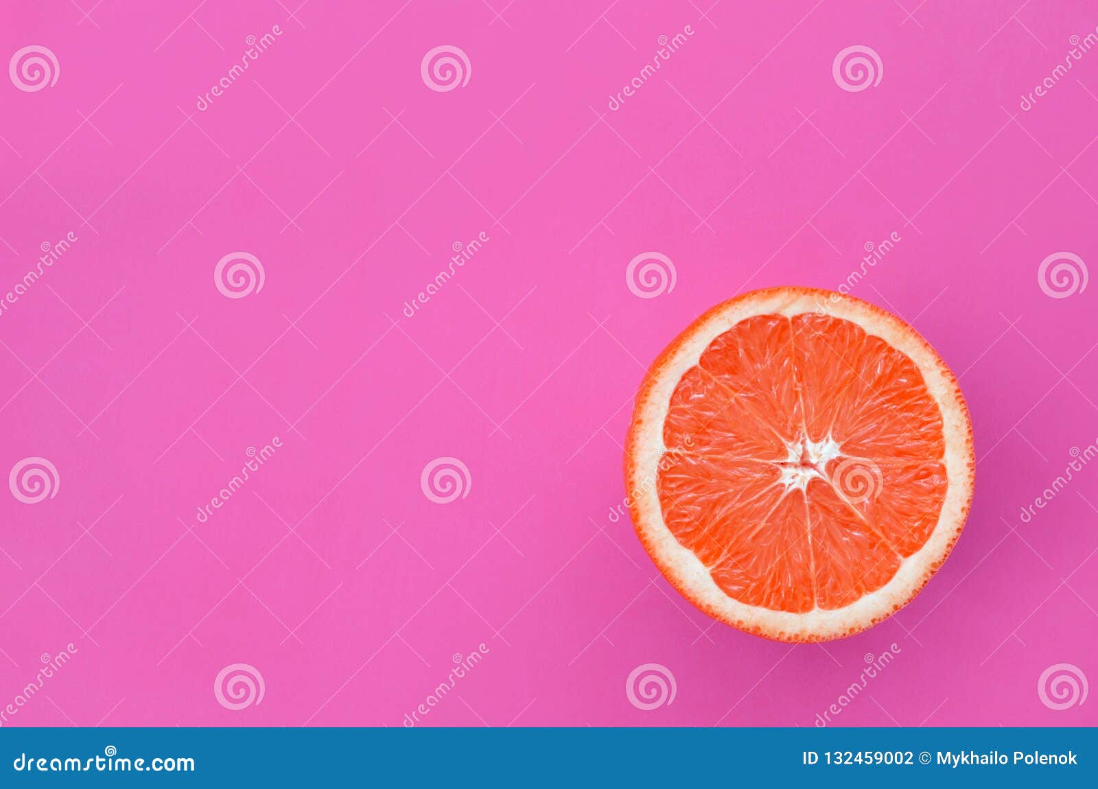 Top View of an One Grapefruit Slice on Bright Background in Purple ...