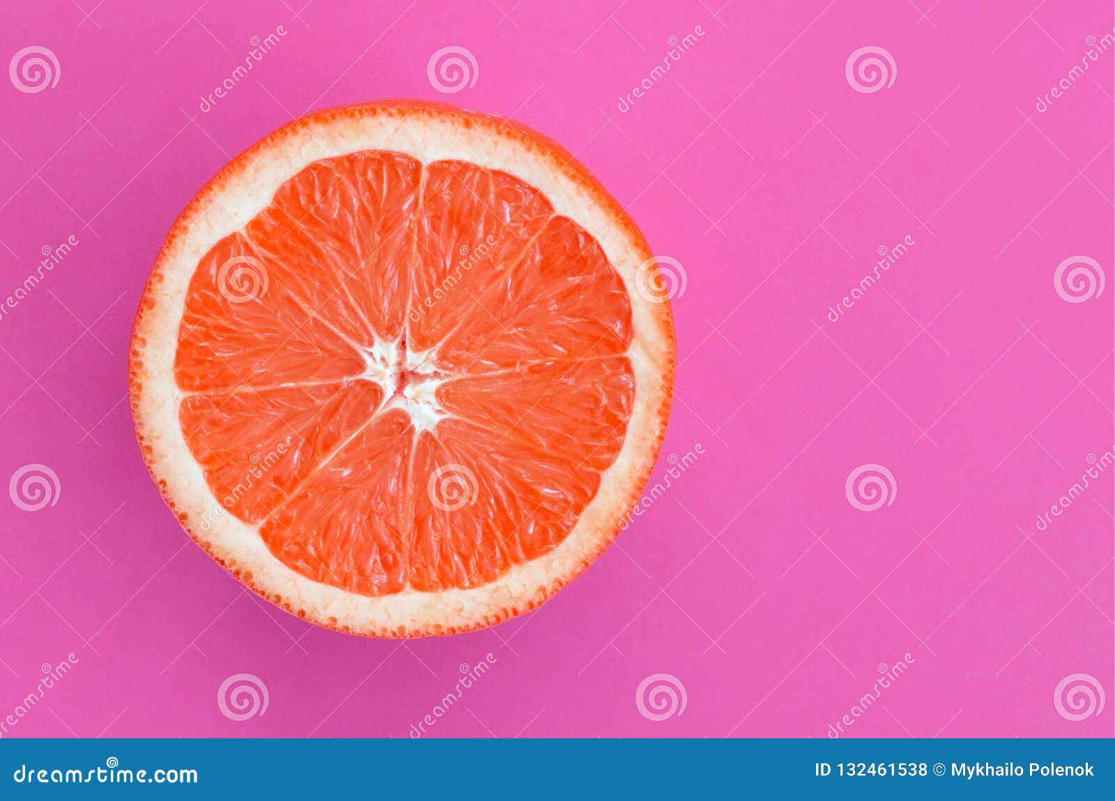 Top View of an One Grapefruit Slice on Bright Background in Purple ...