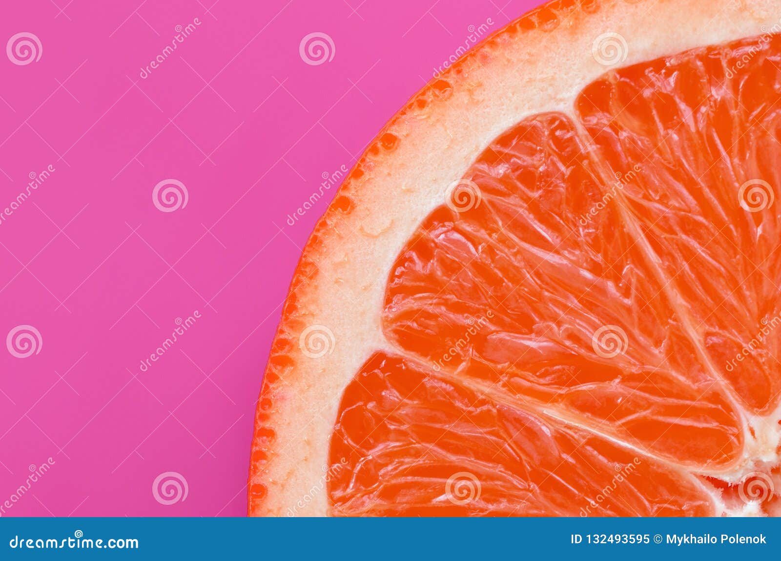 Top View of an One Grapefruit Slice on Bright Background in Purple ...
