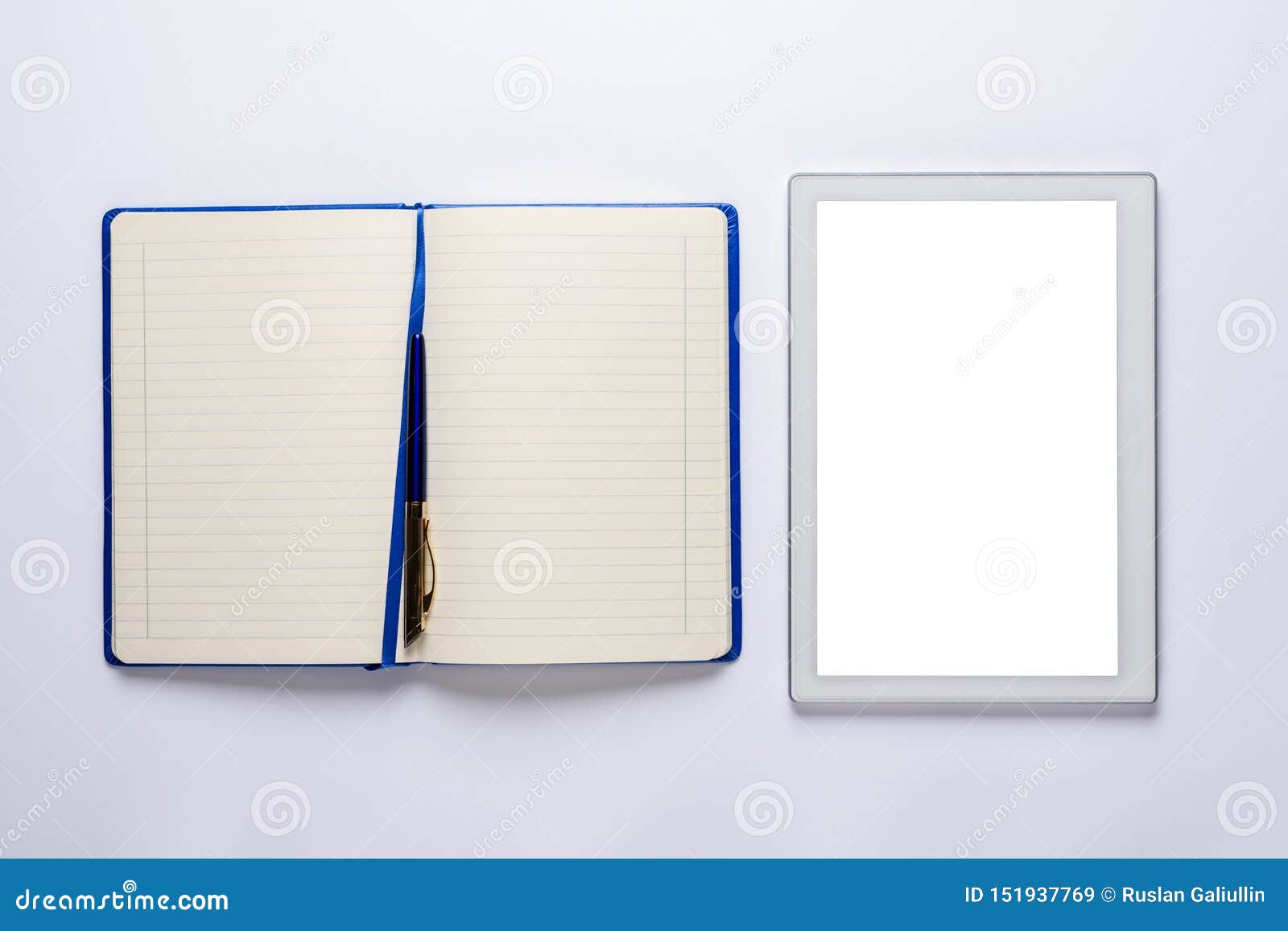 Top View of the Open Blank Notepad and Tablet with the White Screen To ...