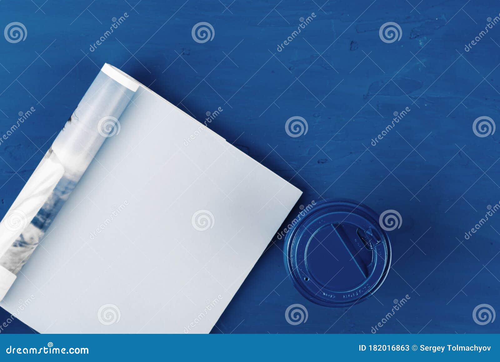 Top View of Open Magazine Page with Copy Space on Classic Blue ...