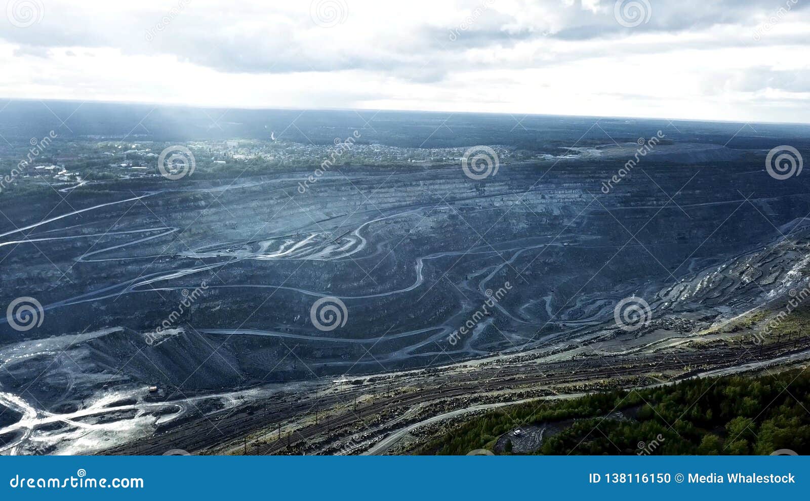 Top View of Open Quarries. Panoramic View of Standing Gray Dust Over ...