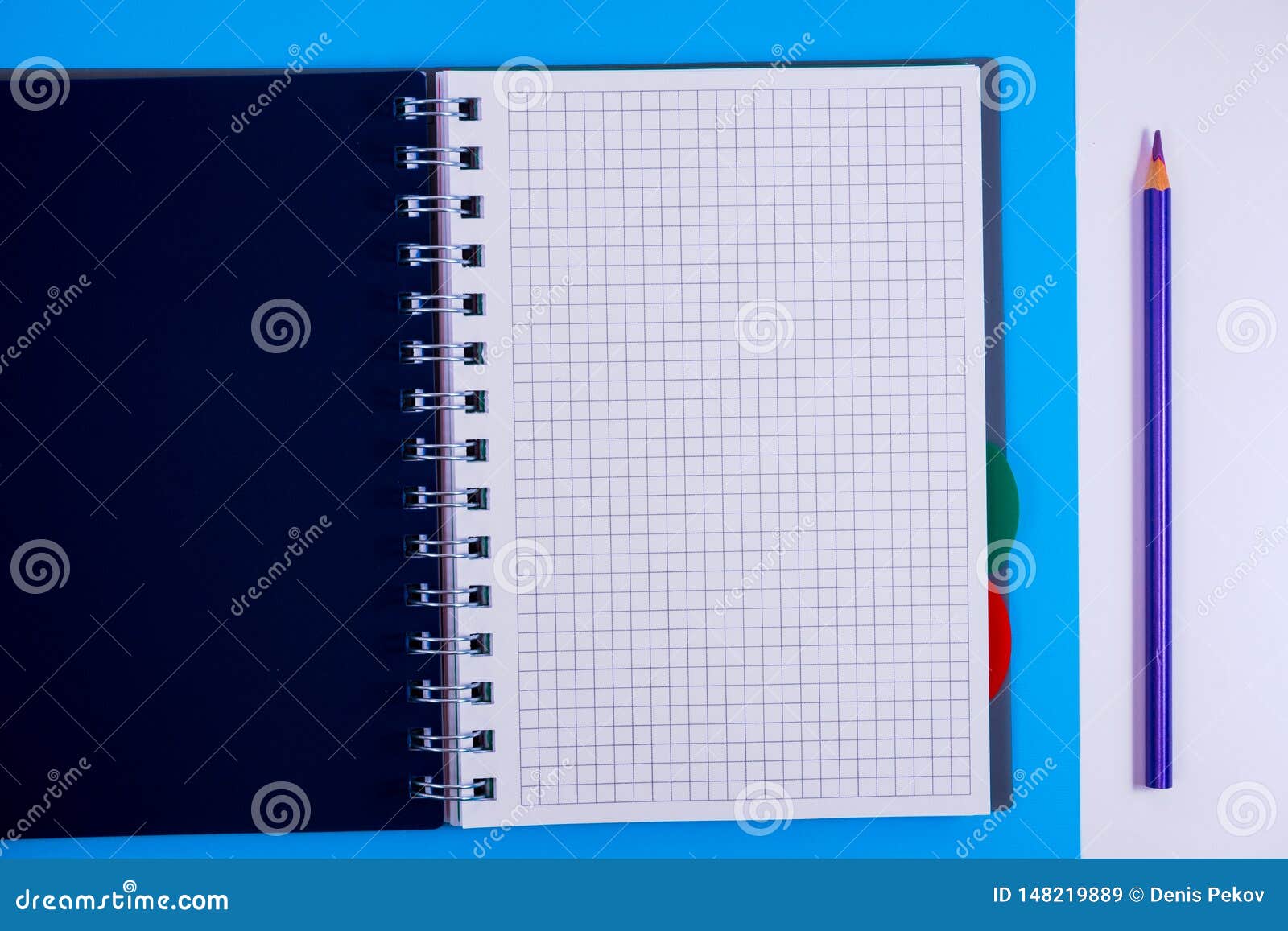 Top View of Open Spiral Blank Notebook with Pencil on Blue Desk ...