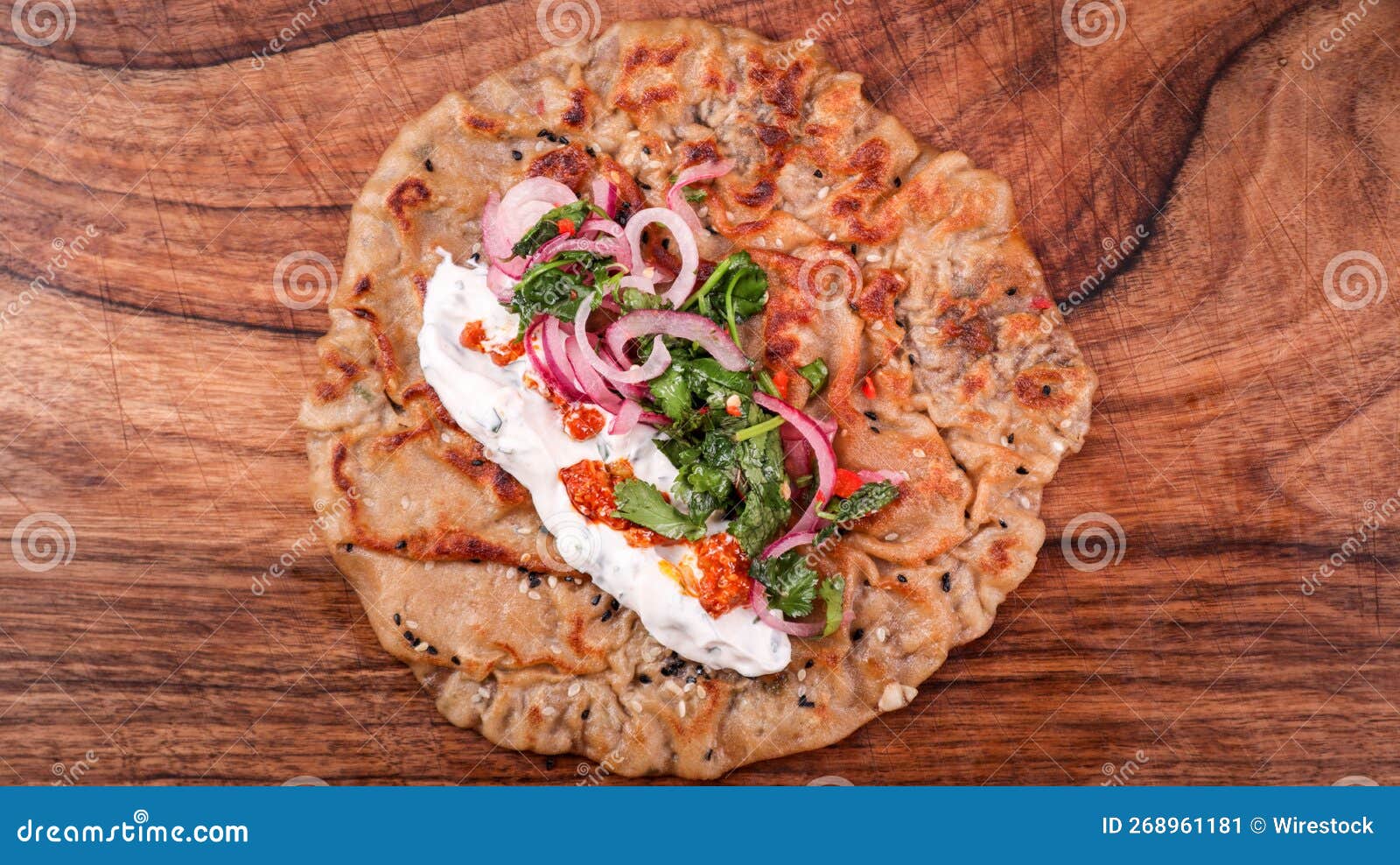 Top View of Paratha Flatbread with Garnish Stock Image - Image of ...