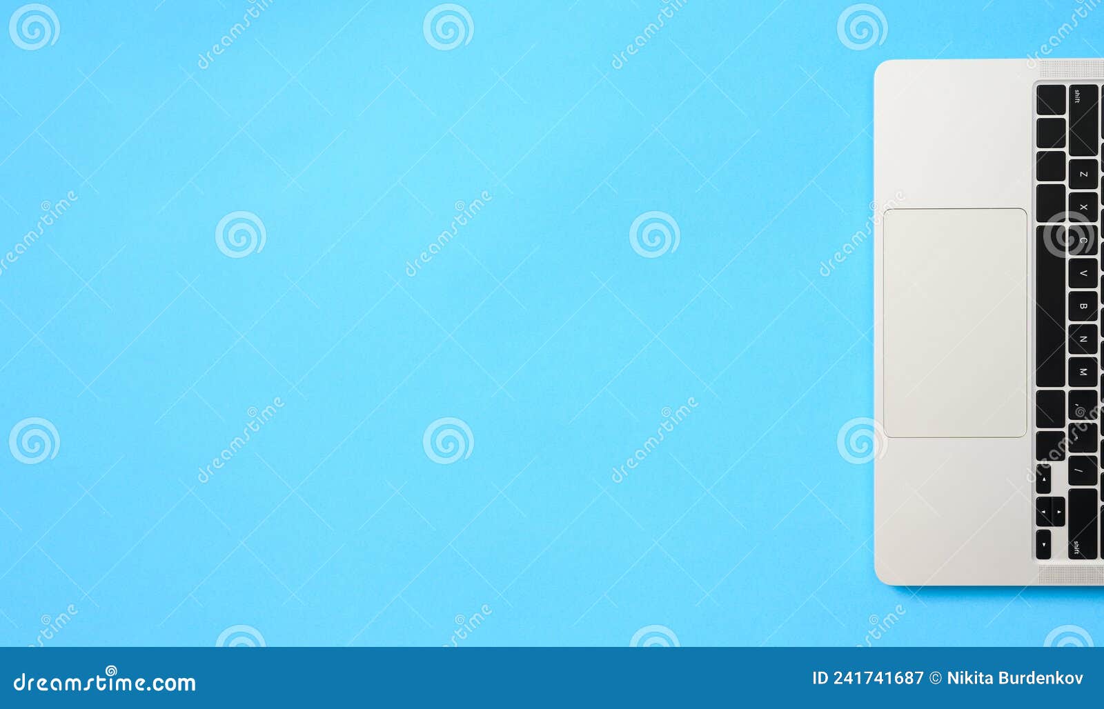 Top View of a Part of a Laptop Keyboard on a Blue Background. Stock ...