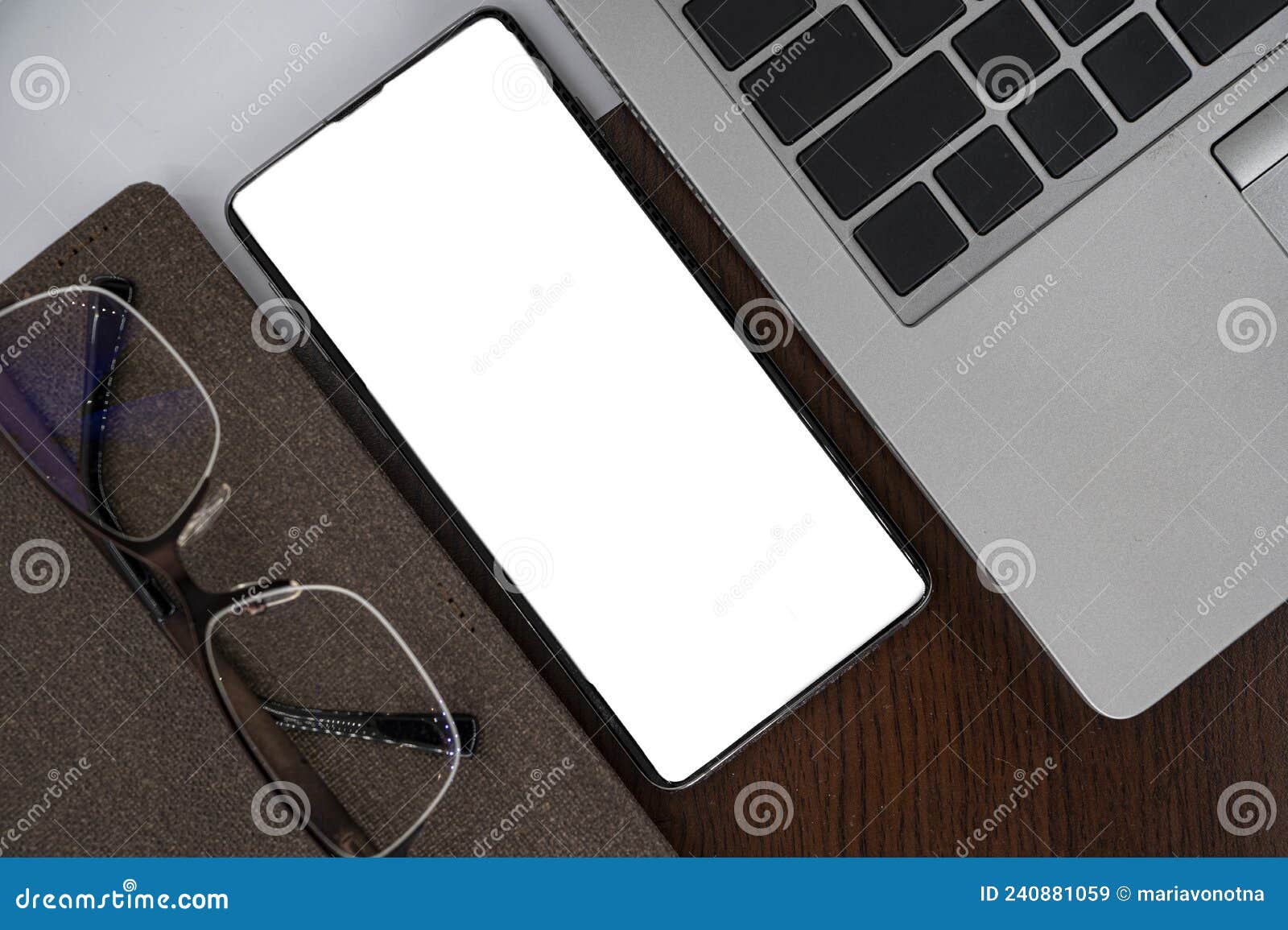 Top View of Phone on Table Near Laptop, Notepad and Glasses with White ...
