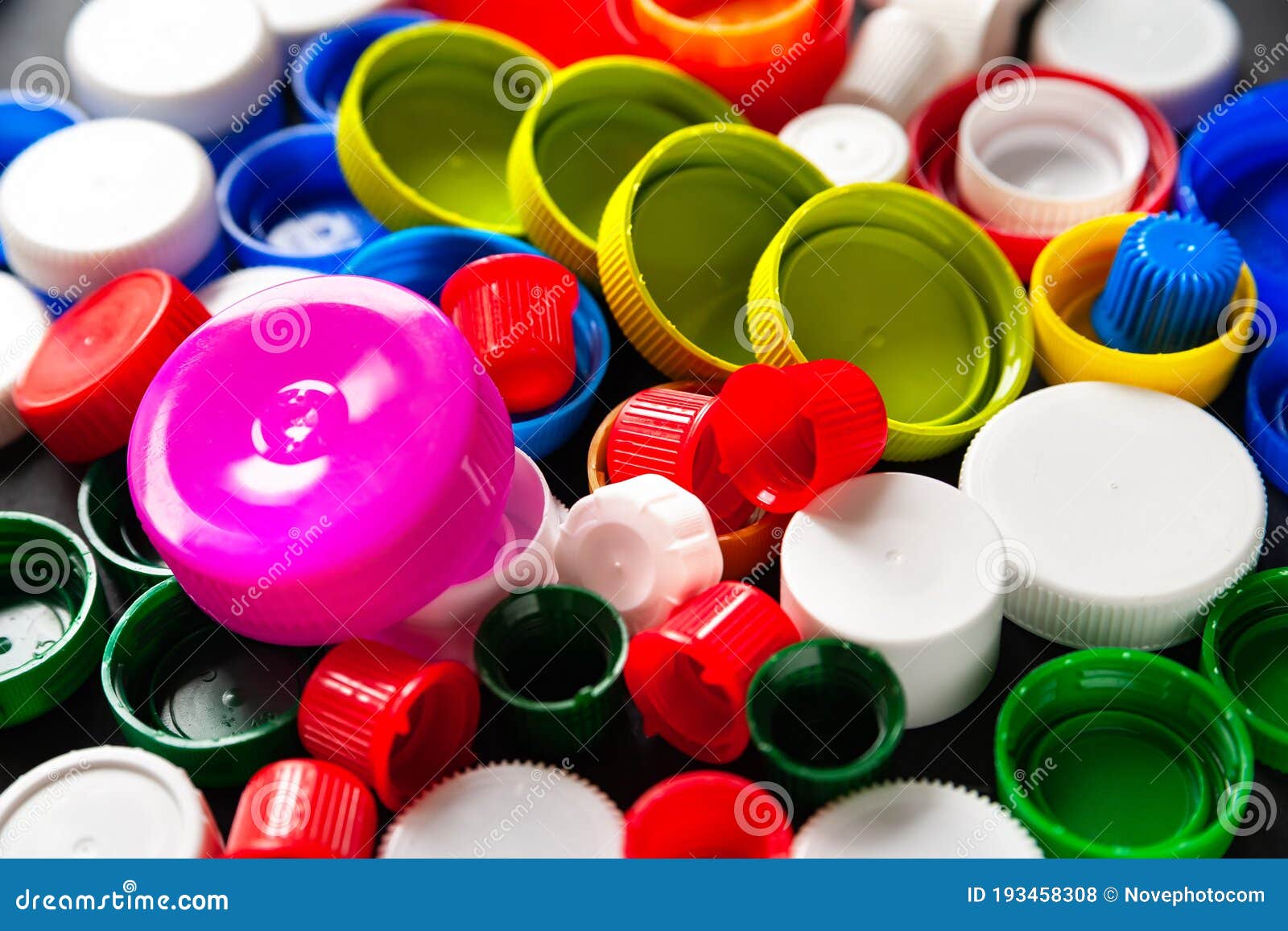 Top View of Plastic Bottle Caps. Caps for Bottles from Recycled Plastic ...