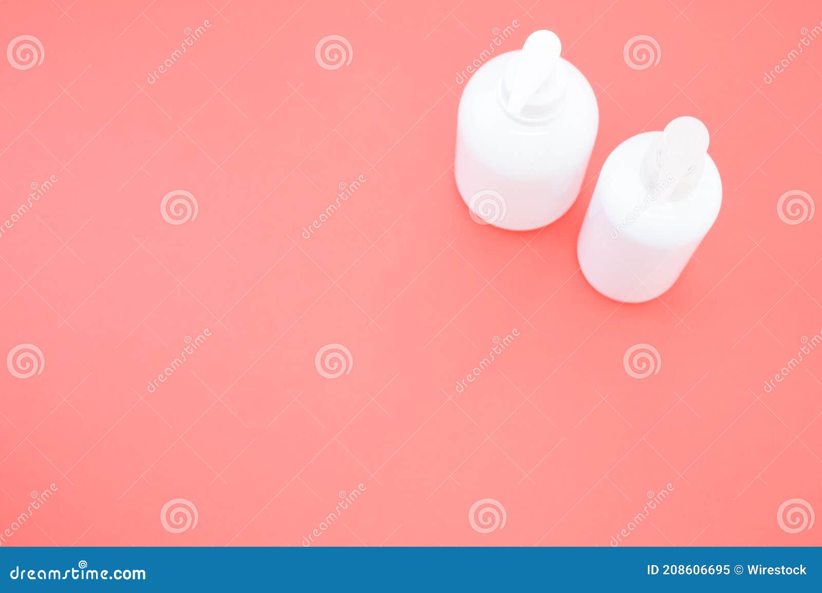 Top View of Plastic Bottles with Pumps on a Red Surface Under the ...